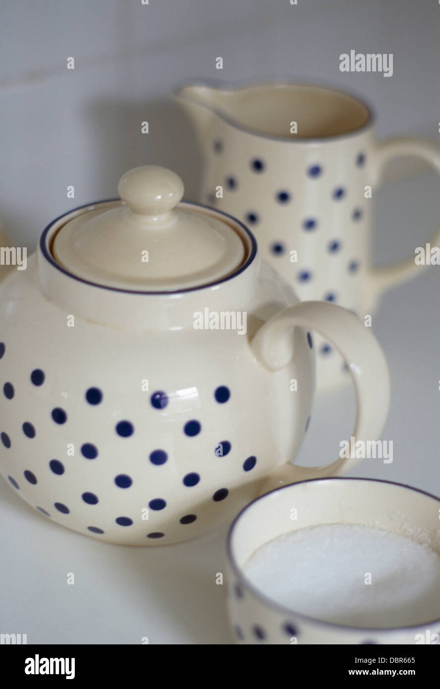 Close-up of spotted cream teapot and jug with sugar bowl Stock Photo ...