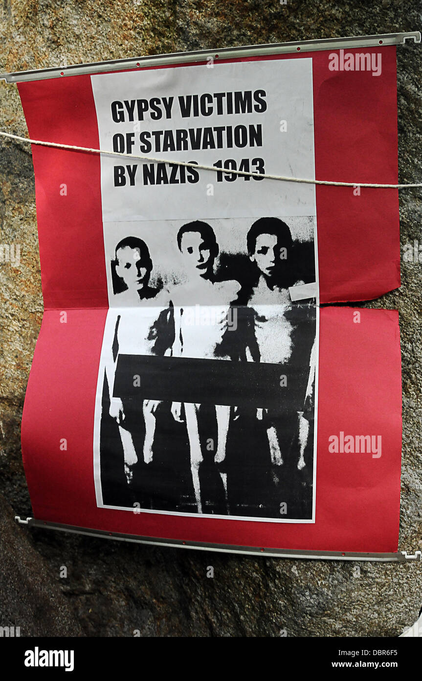 London, UK. 20th July, 2013. A placard written "GYPSY STARVATION BY ...