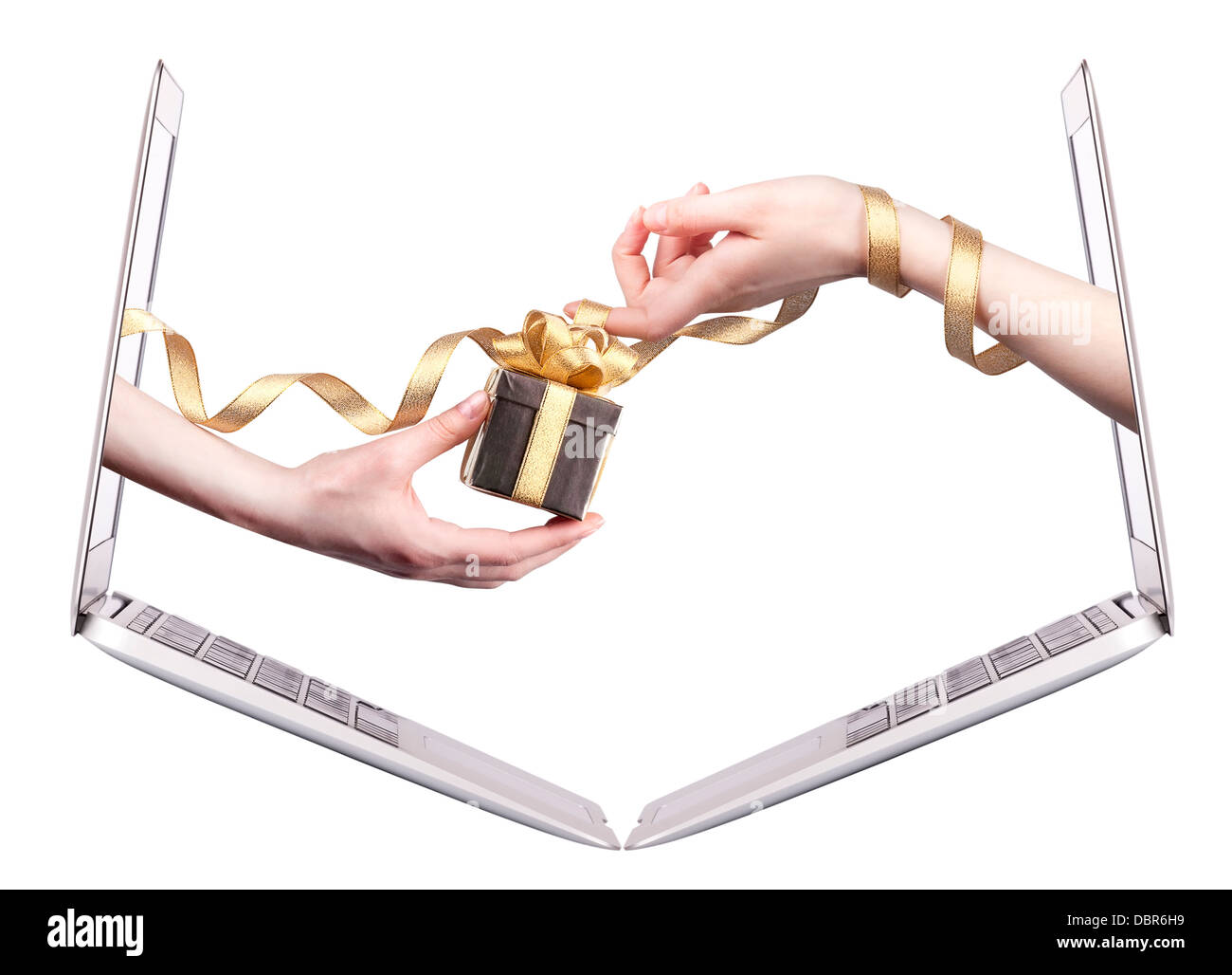 hand with a gift come out from a screen of a laptop computer isolated ...