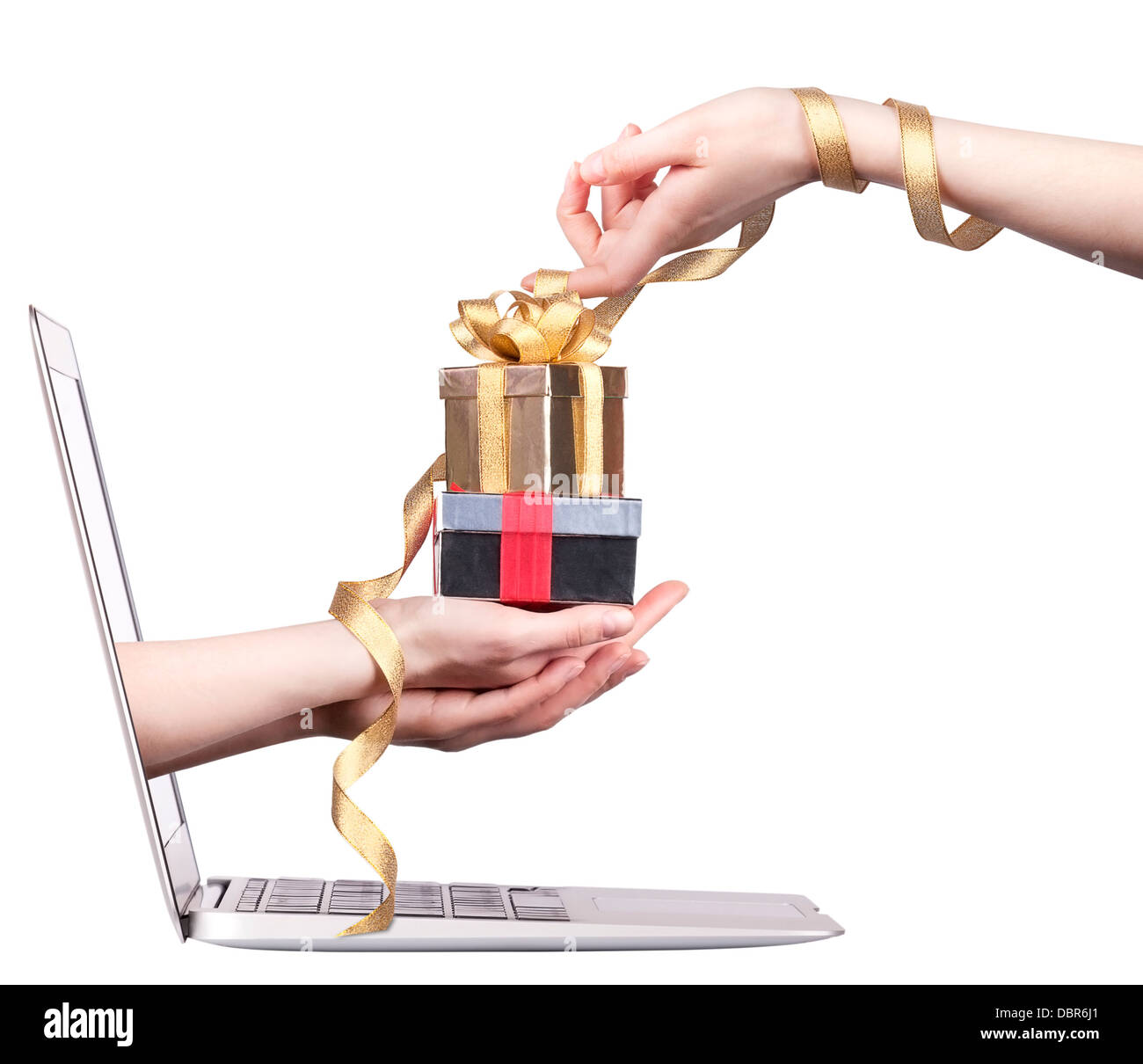 hand with a gift come out from a screen of a laptop computer isolated ...