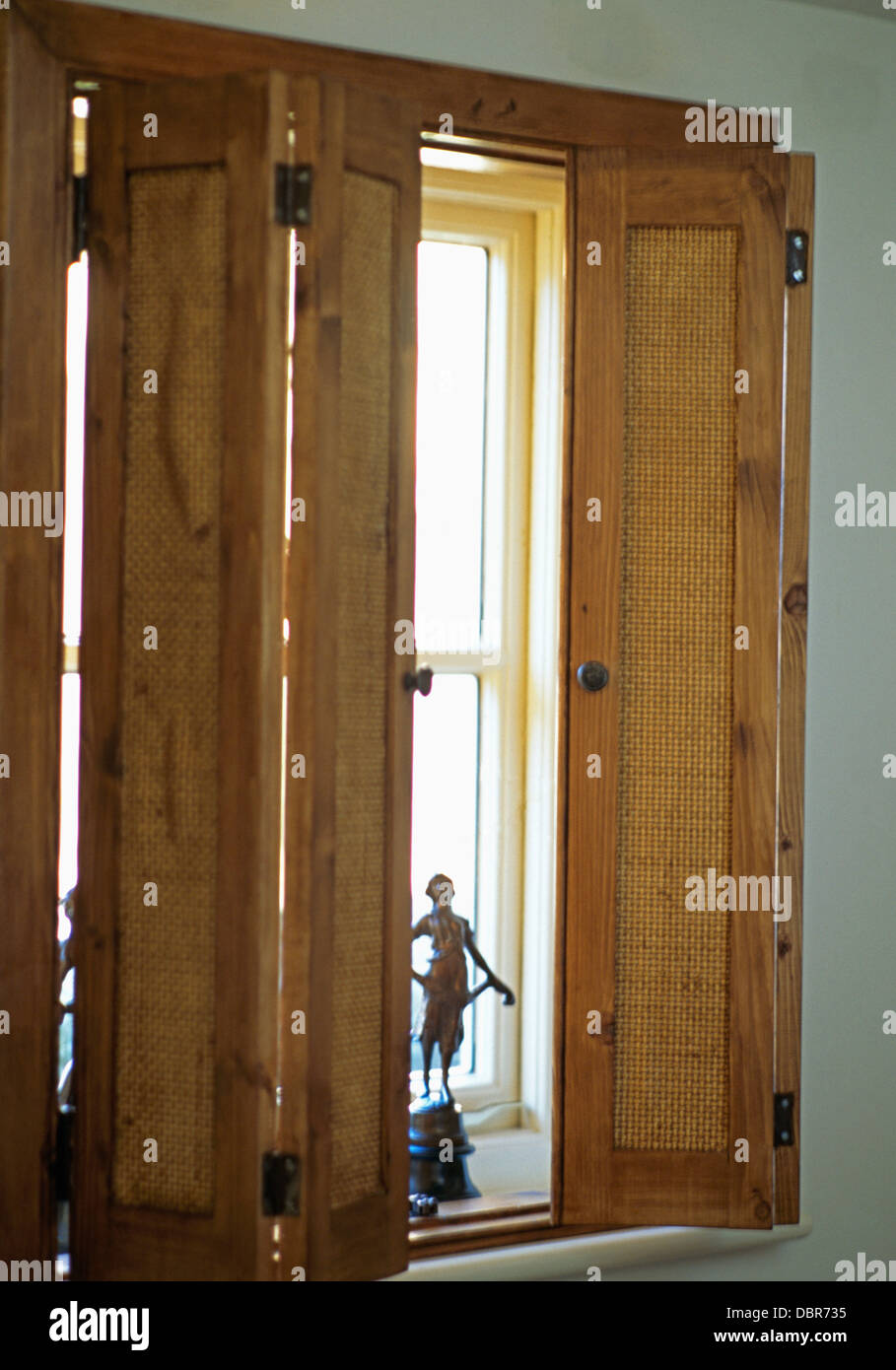 Close-up of window with wooden shutters Stock Photo - Alamy