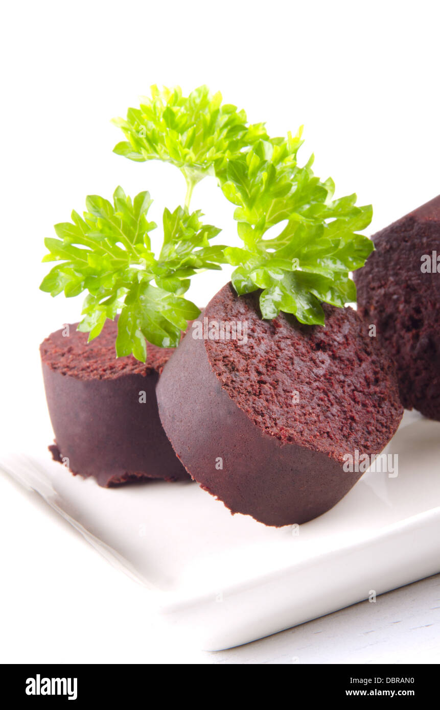 home made irish black pudding with parsley Stock Photo - Alamy