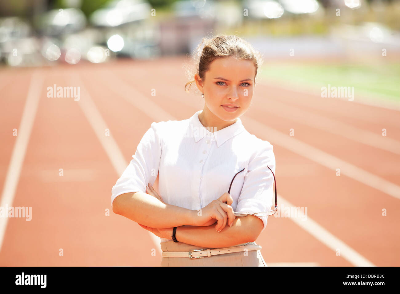Business woman sport manager at athletic stadium Stock Photo - Alamy