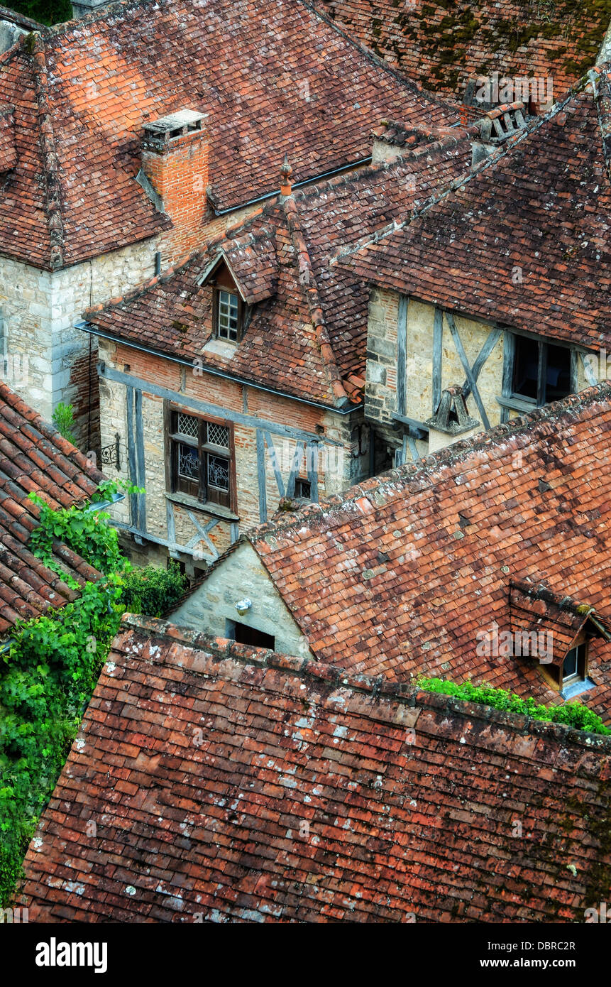 Old village detail of houses with brick roofs and windows Stock Photo ...