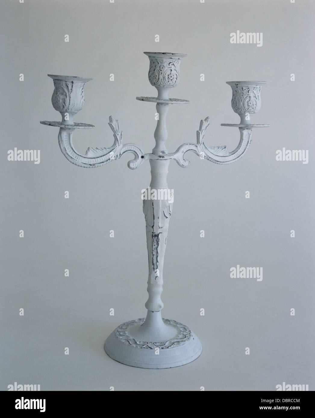 Close-up of white three-branch candelabra Stock Photo - Alamy