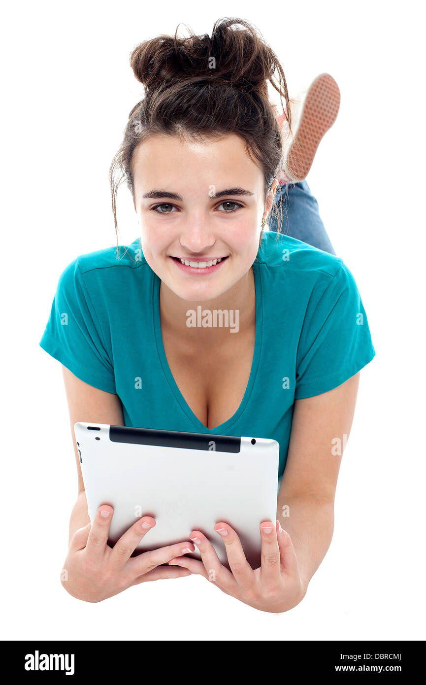 Glamorous pretty girl posing with wireless tablet Stock Photo - Alamy