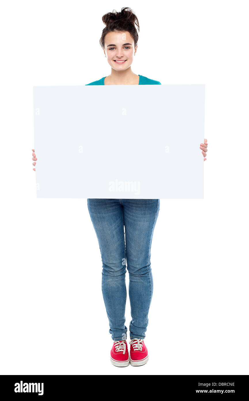 Full length portrait of stylish girl presenting banner ad Stock Photo ...