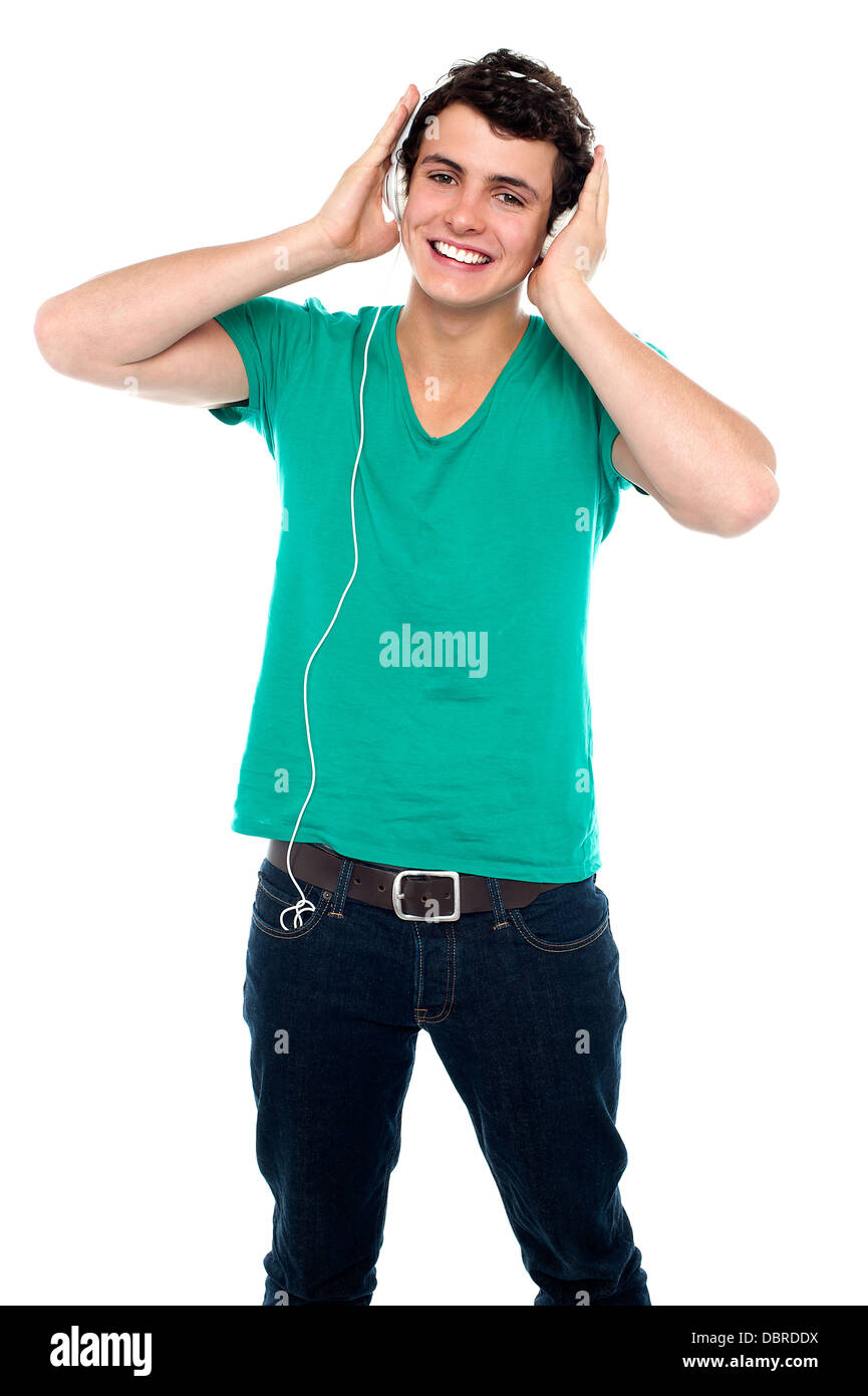 Cheerful guy enjoying loud music Stock Photo - Alamy