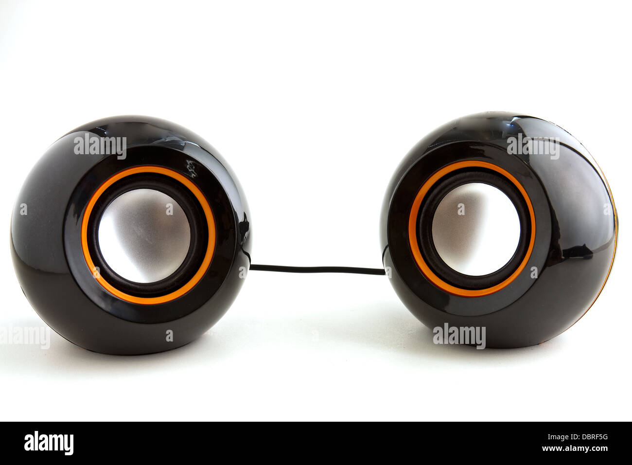 Two speakers for desktop PC in black and orange colors Stock Photo - Alamy