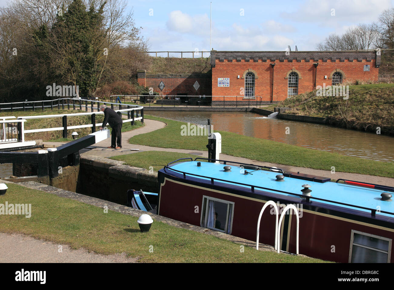 A narrowboat descending Foxton Locks, on the Grand Union Canal, with ...
