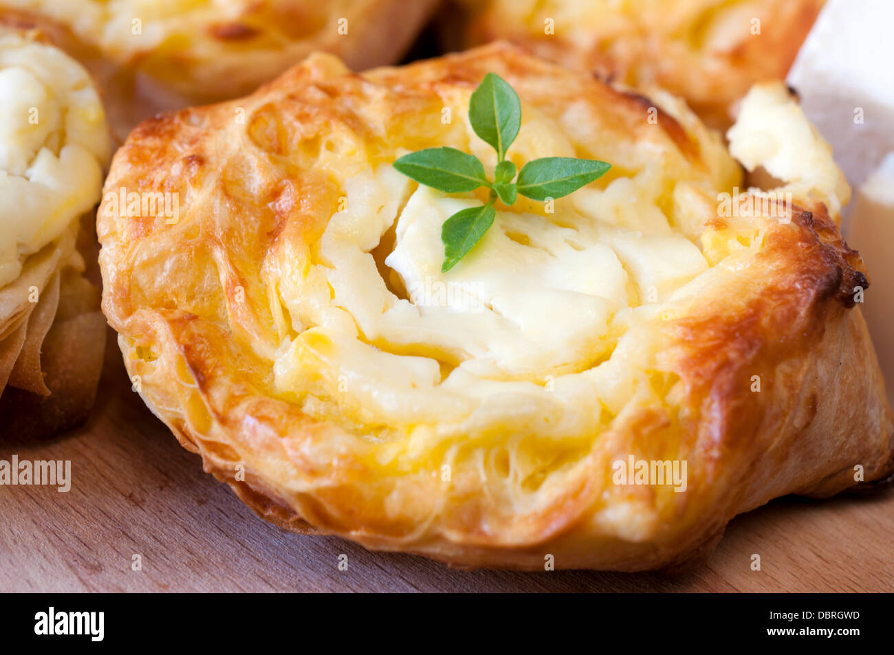 Tasty baked pastry with melted feta cheese Stock Photo - Alamy