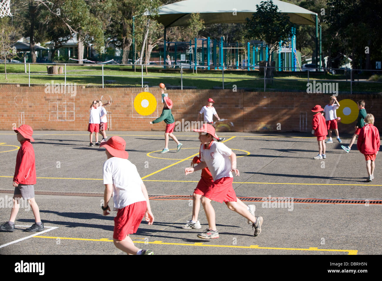 Pupils at an Australian primary school playing sport in the school ...