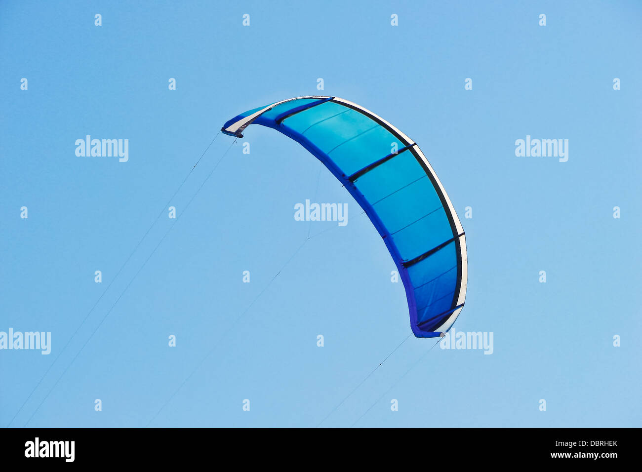 Kite over a blue sky Stock Photo - Alamy