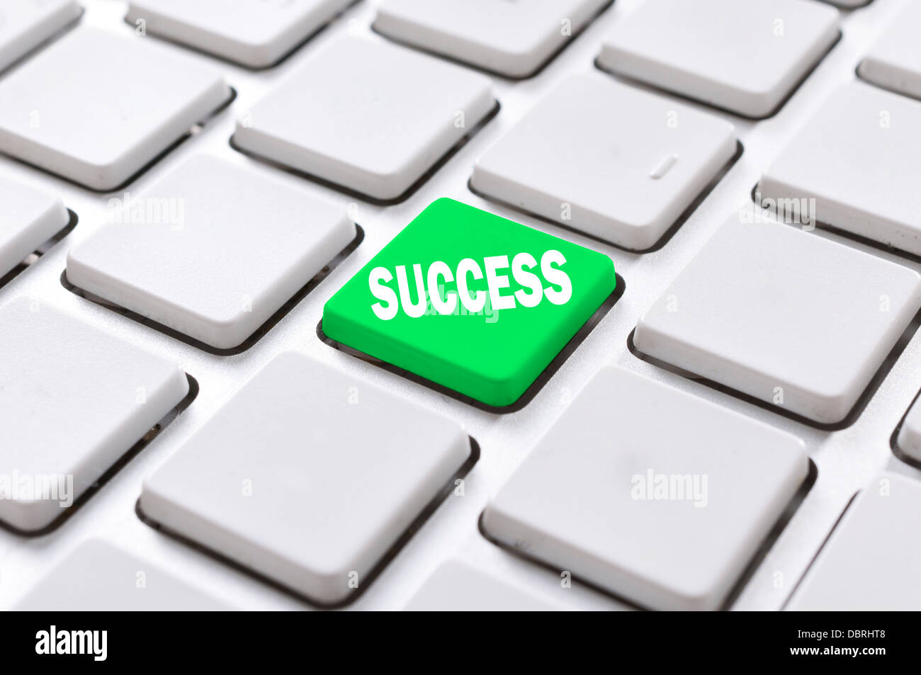 Green success button on the computer keyboard Stock Photo - Alamy