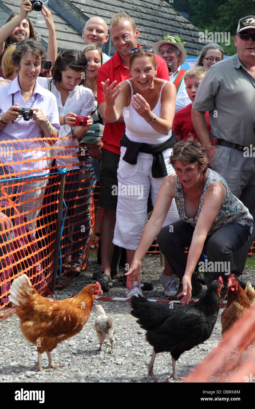 Competitors & their fowl at The Hen Racing World Championships outside ...