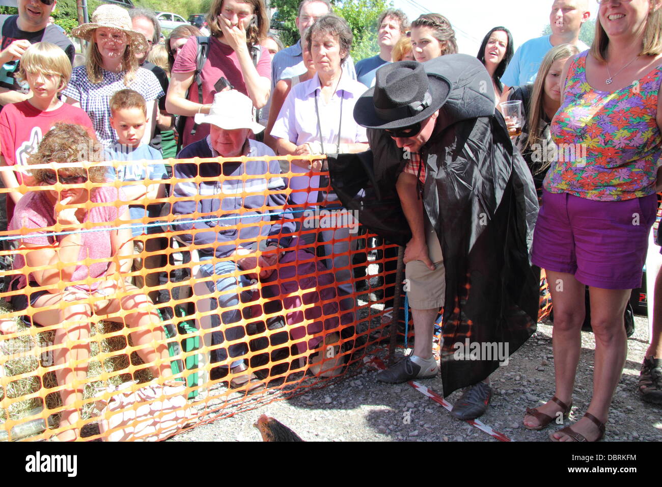 Competitors & their fowl at The Hen Racing World Championships outside ...