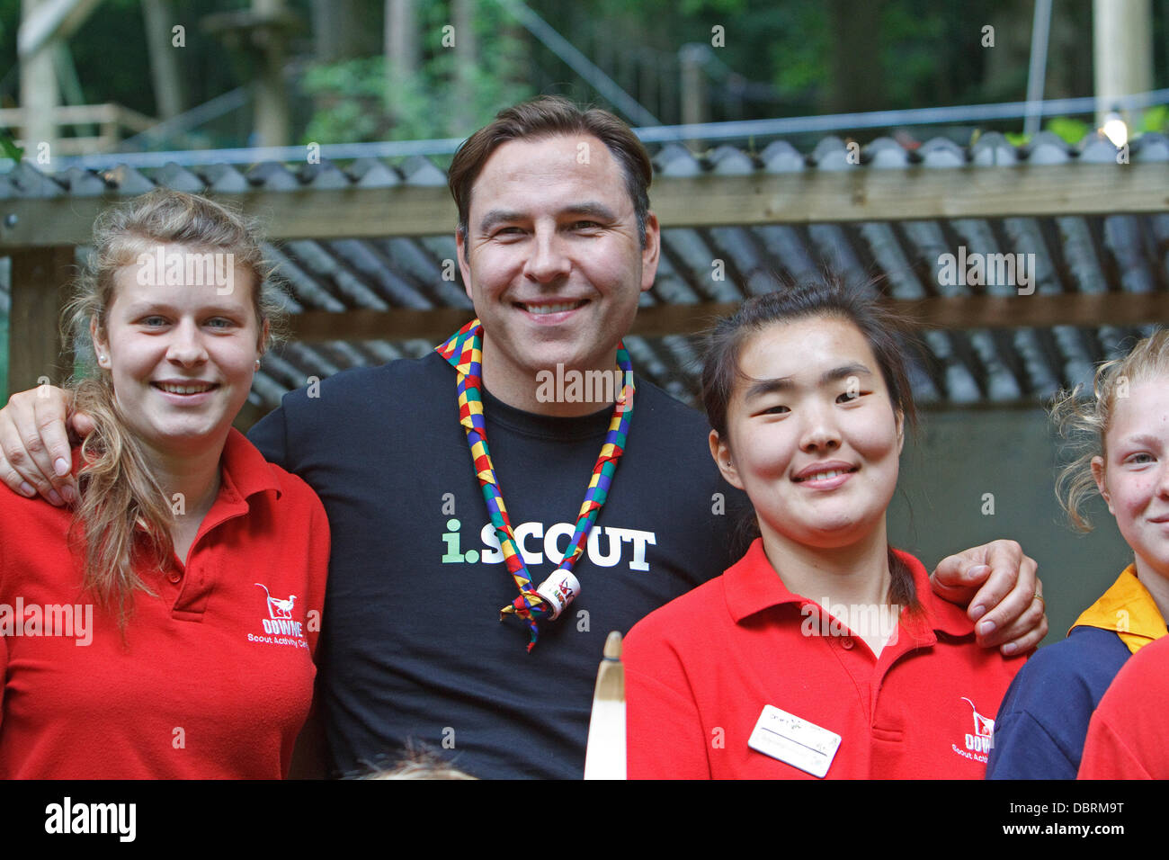 Downe, UK. 3rd August 2013. David Walliams poses with 3 girl scouts at ...