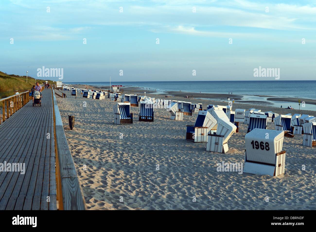 The beach in the light of the setting sun on Sylt Island in Westerland ...