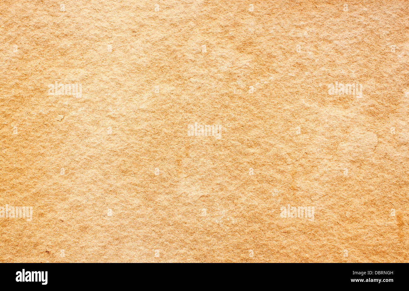 Polished yellow granite as a background wall Stock Photo - Alamy