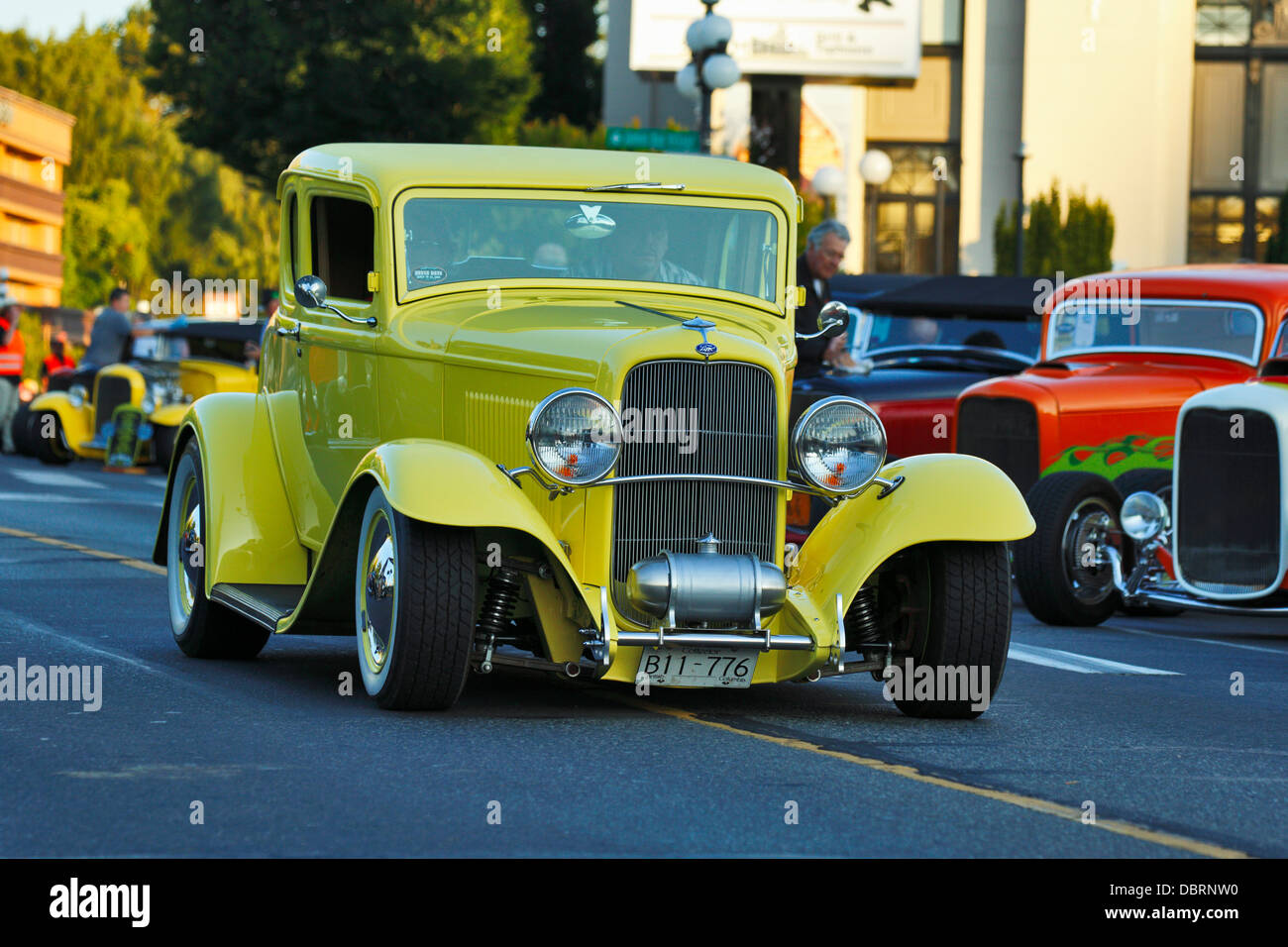 1932 Ford driving down road during 2013 Deuce Days Hot Rod show ...