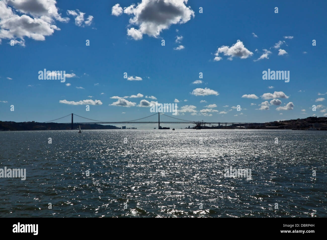 View on the river Tagus with the famous bridge Ponte de 25 de Abril in ...