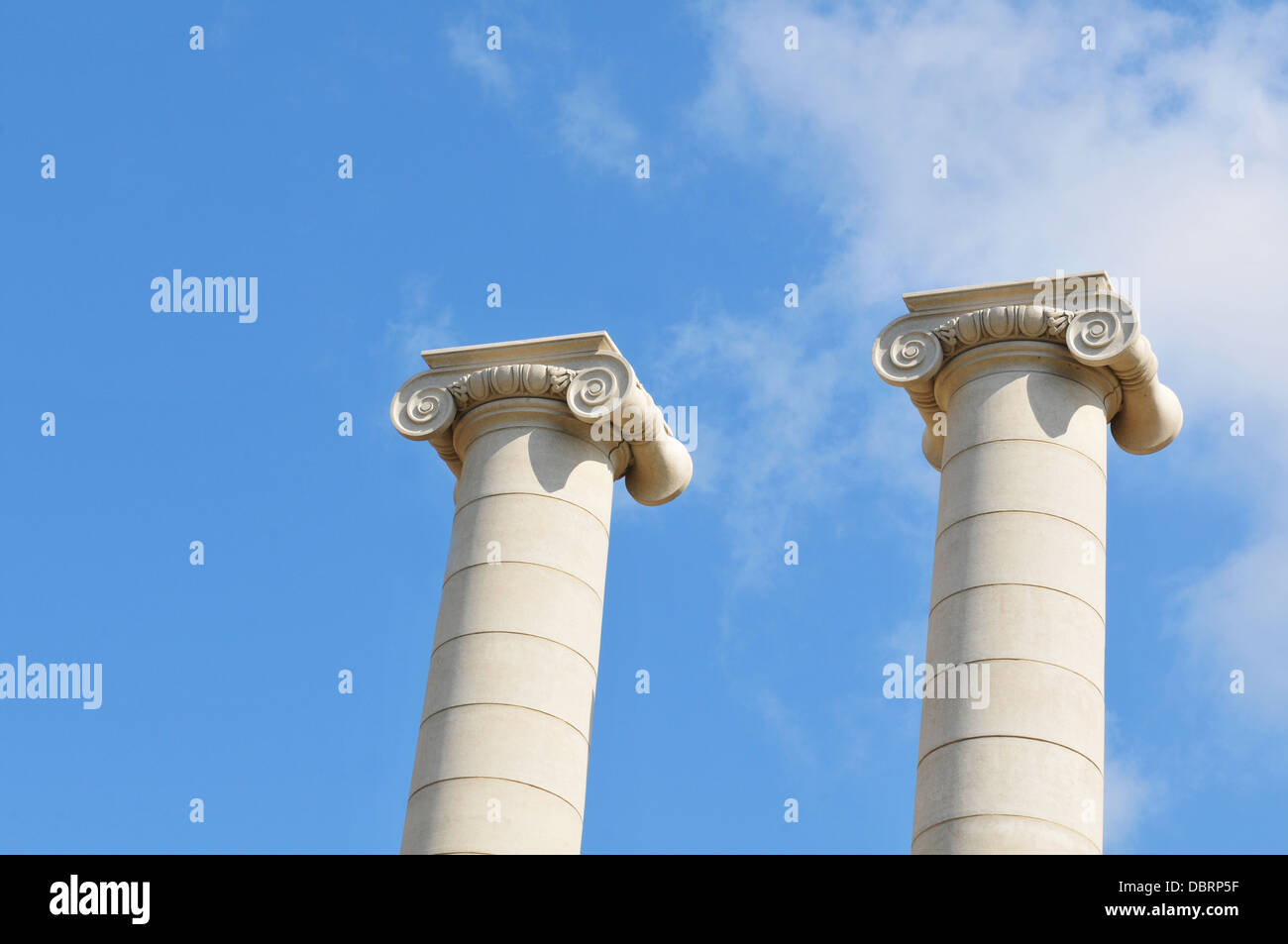 Architectural detail of white Greek columns against blue sky Stock ...