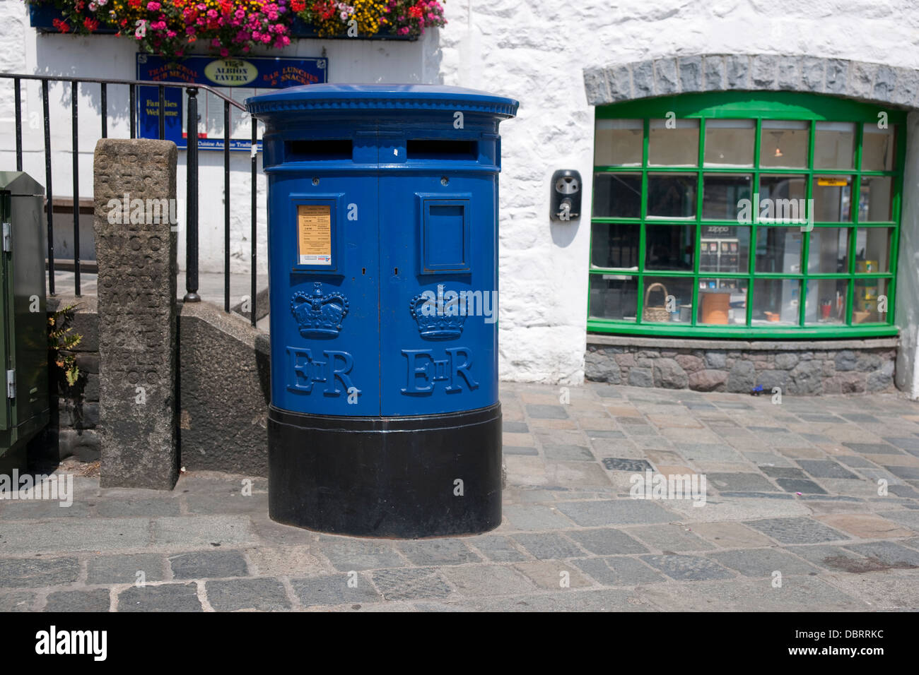 Blue Post Box in St Peter Port Guernsey Stock Photo - Alamy