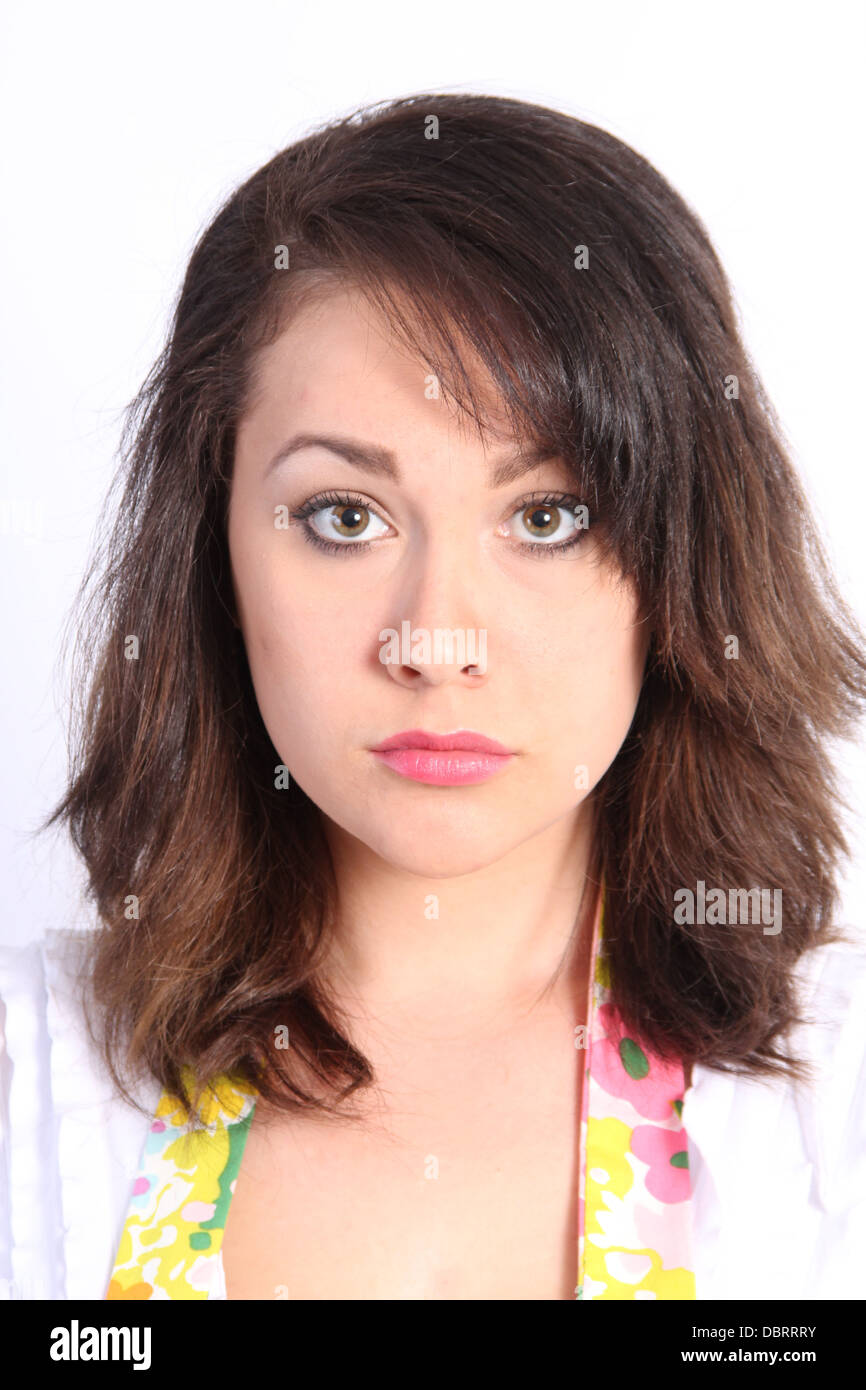 Pretty young woman, focus on a pretty face, looking straight ahead ...