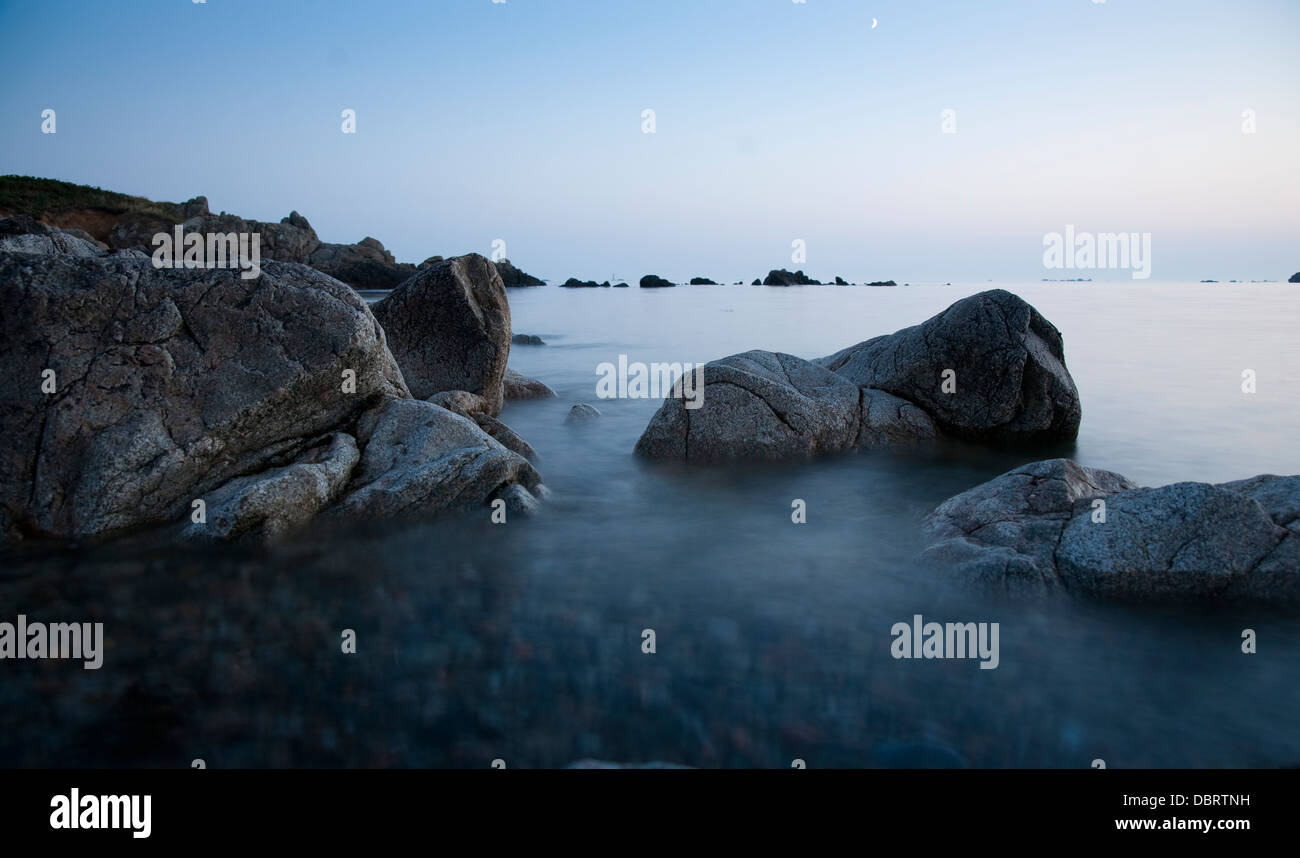 L'Erée rocks tide island guernsey channel islands Stock Photo - Alamy