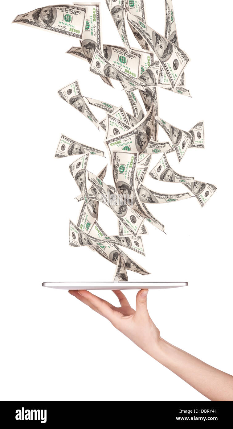 making money with computer concept - Money pouring out from a Tablet pc ...