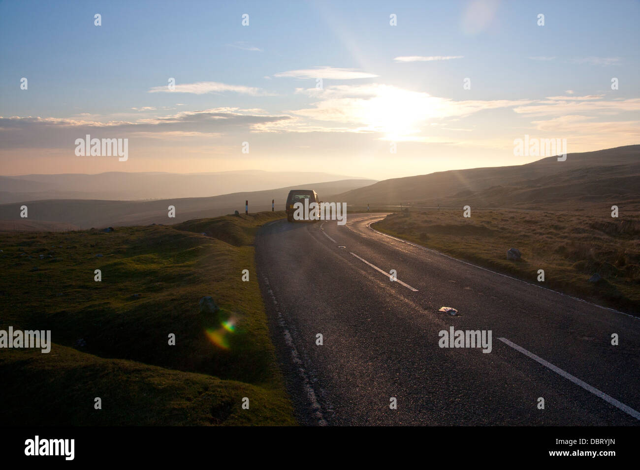 4WD vehicle on bend on summit of A4069 mountain road across Black ...