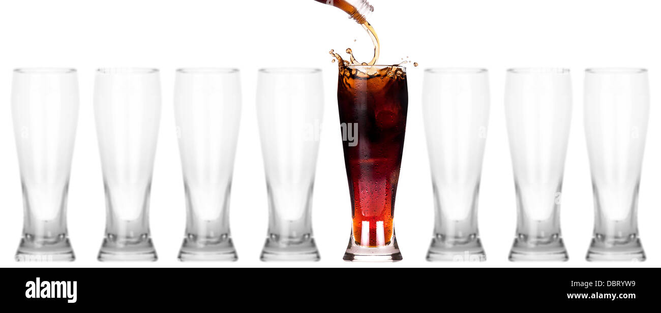 full and empty glass of fresh cola drink isolated on a white background ...