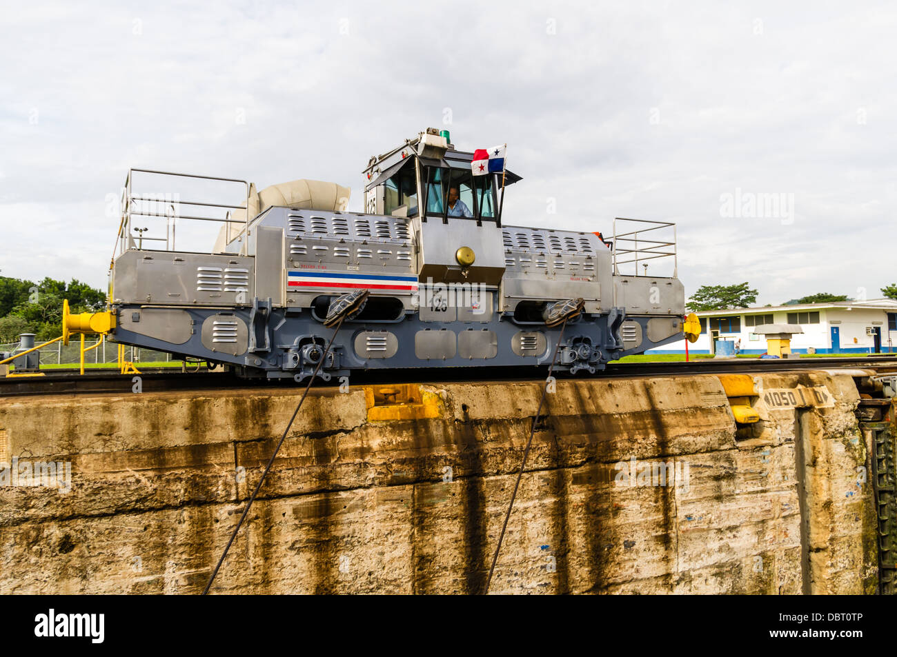 Panama Canal Panama Electric mule locomotive assists a ship on Panama ...