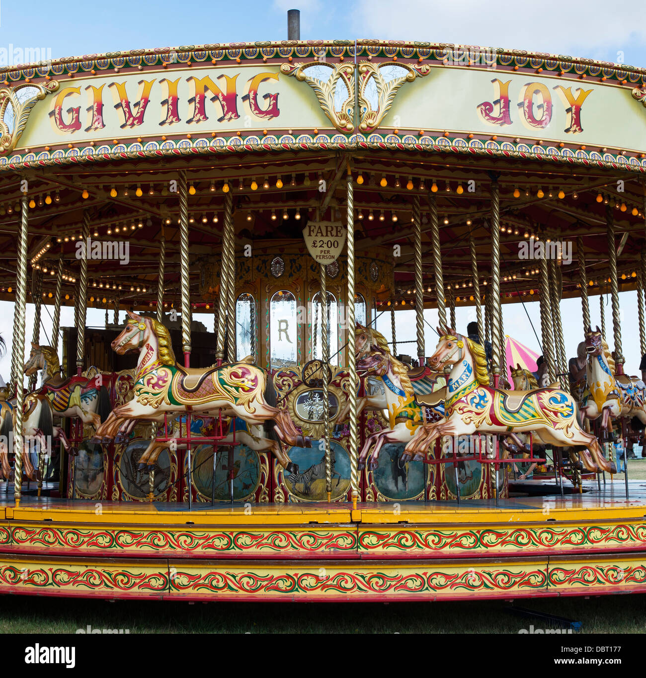 Steam Galloping horse carousel, fairground ride at a steam fair ...