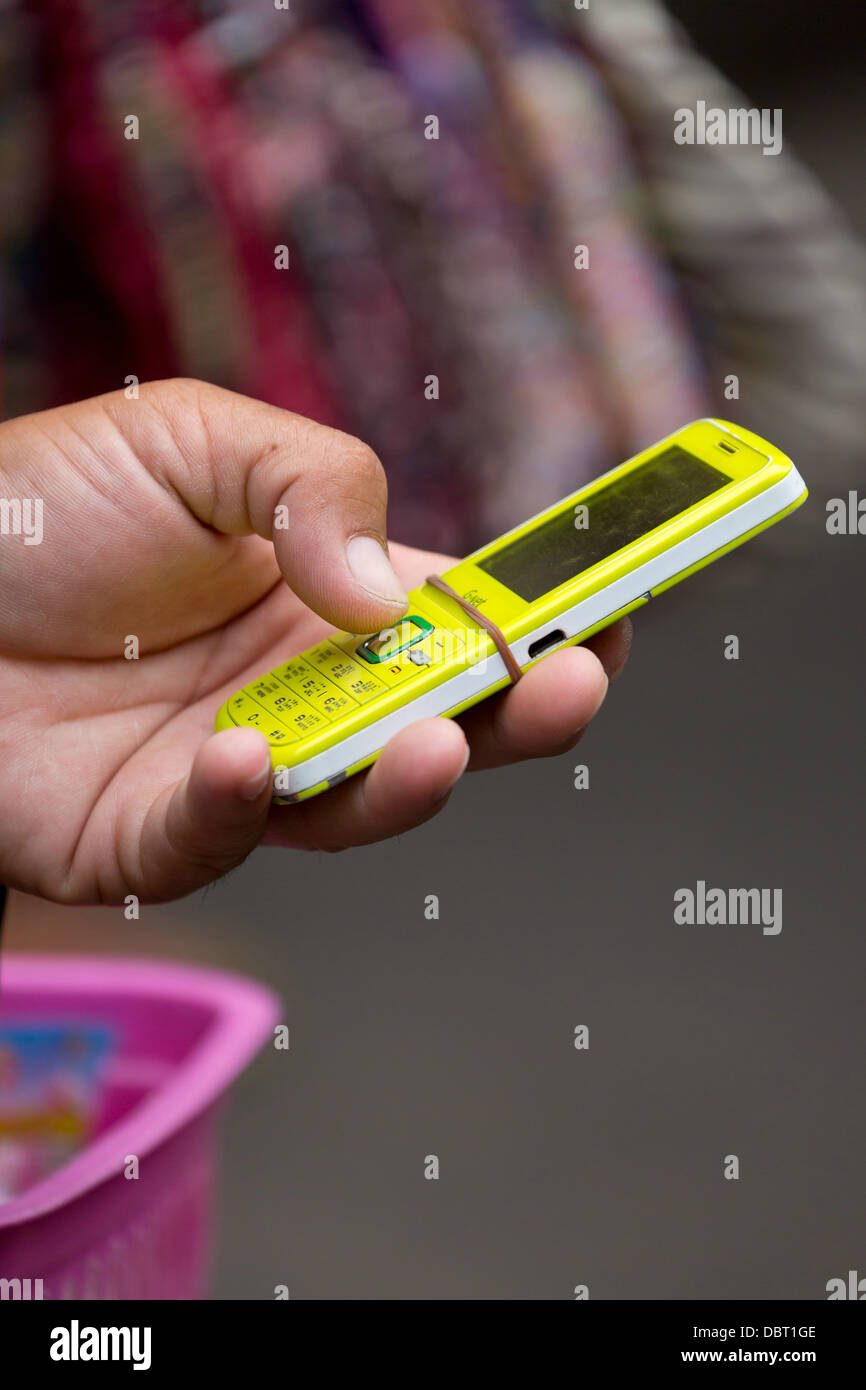Close-up of yellow Cellphone in Bangkok, Thailand Stock Photo - Alamy