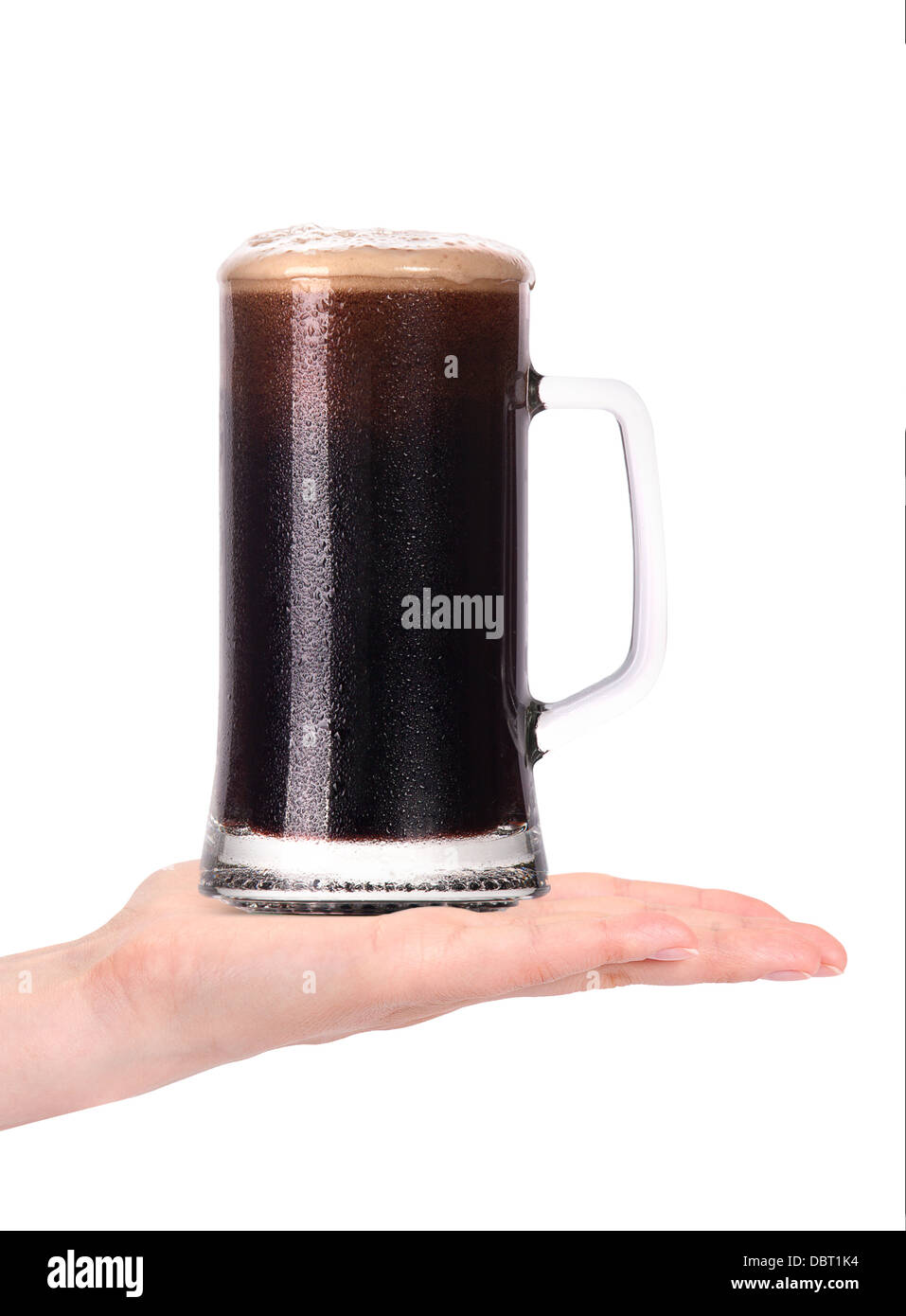 hand offering glass of beer in ice isolated on a white background ...
