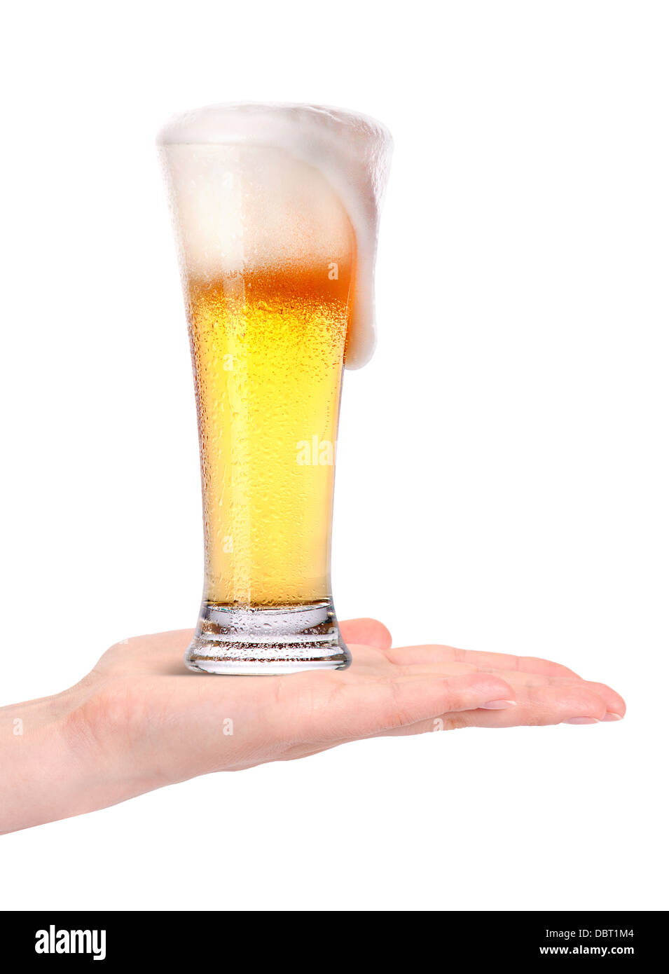 hand offering glass of beer in ice isolated on a white background ...