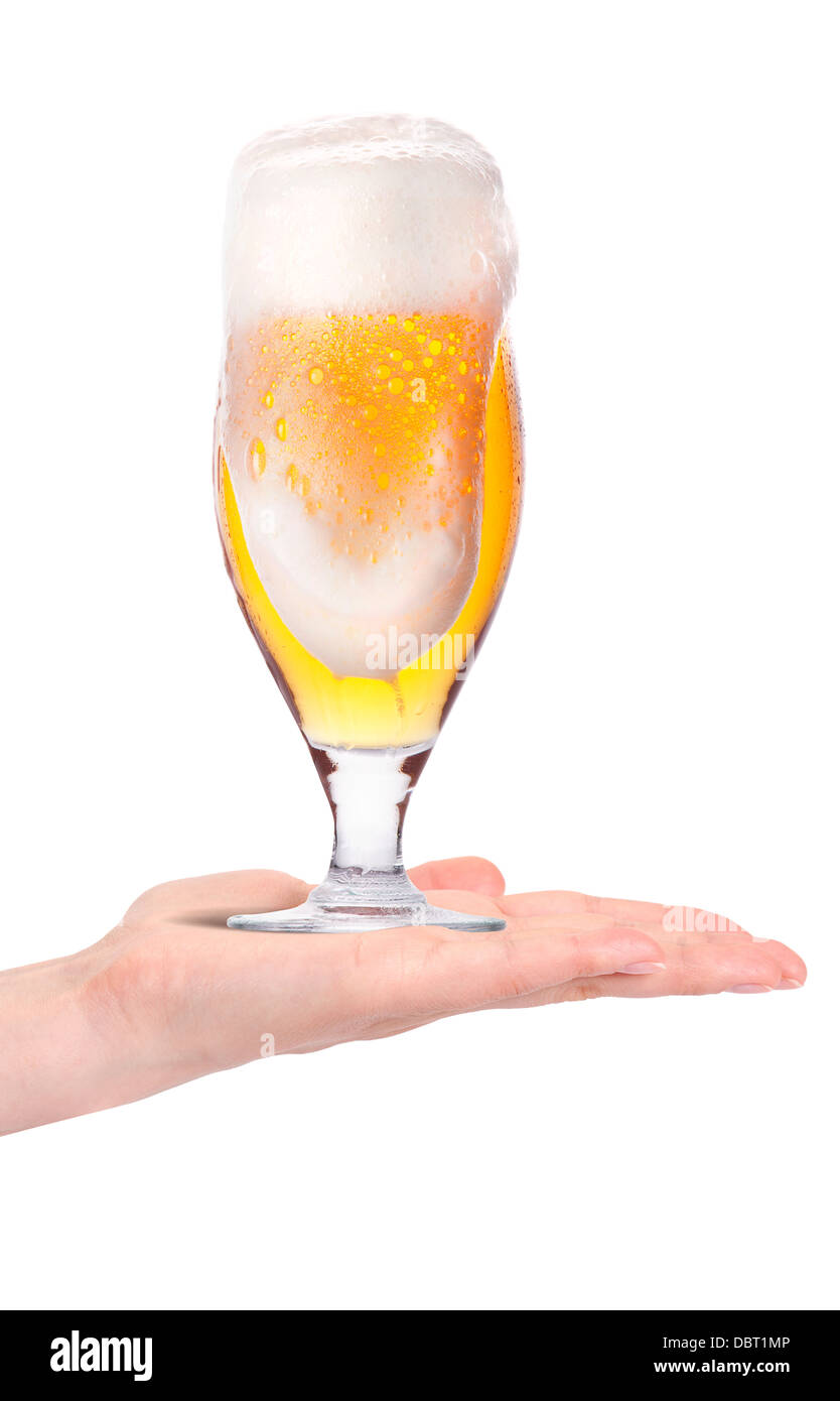 hand offering glass of beer in ice isolated on a white background ...