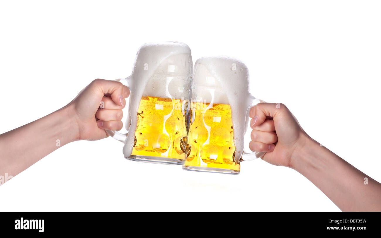 two hands holding beers making a toast Stock Photo - Alamy