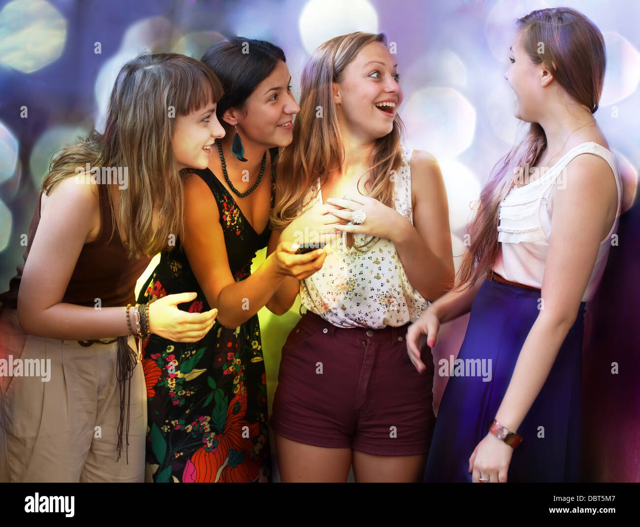 Beautiful student girls during phone call Stock Photo - Alamy