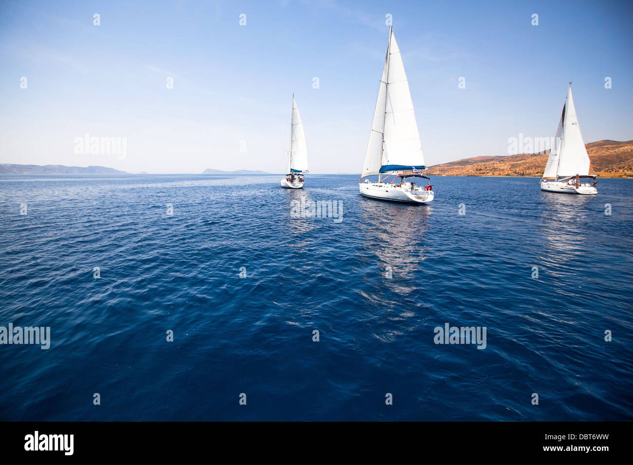 Group yacht sailing Stock Photo - Alamy