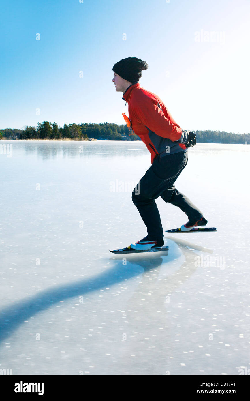 Side view man ice skating hi-res stock photography and images - Alamy