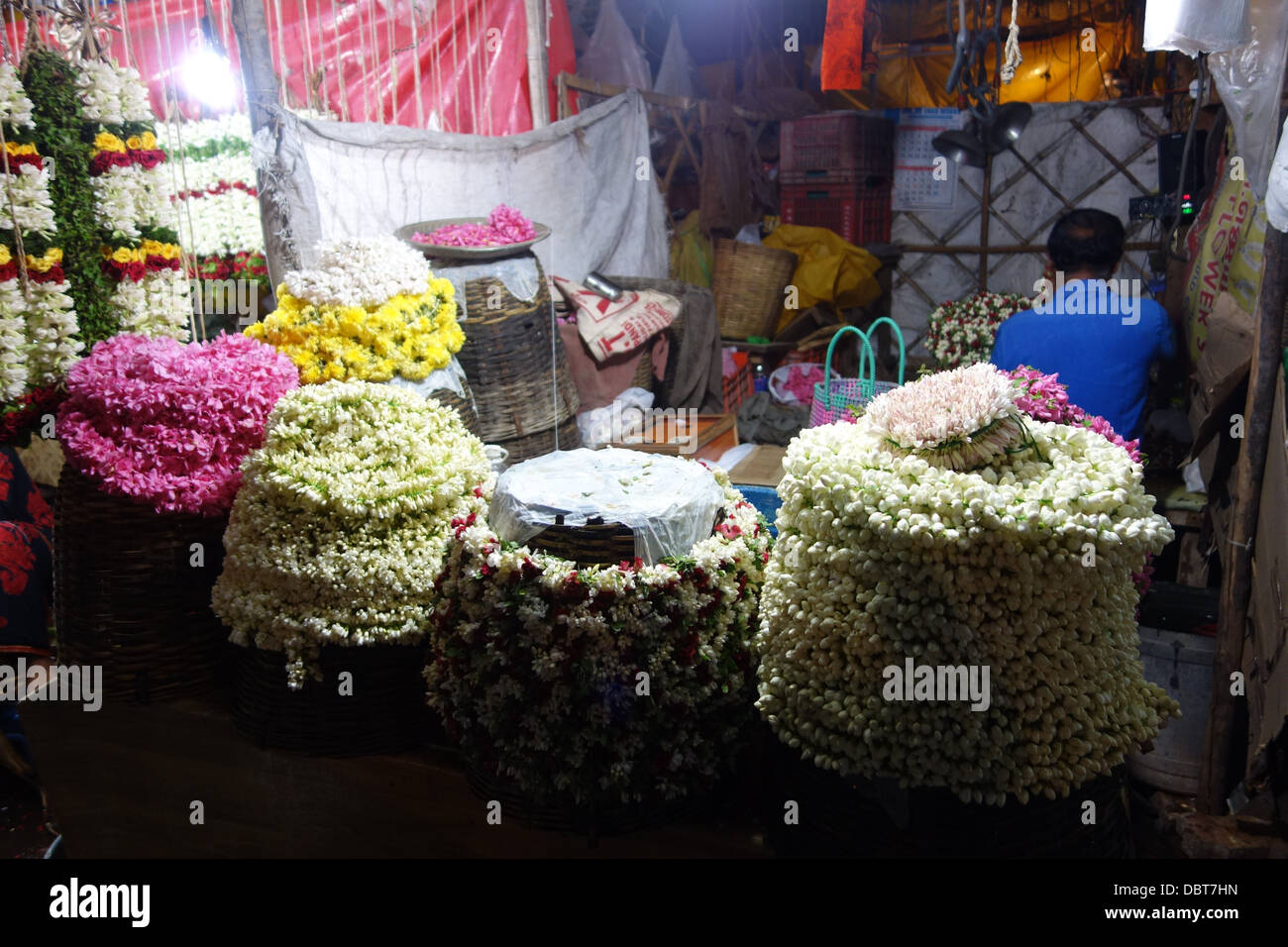 flowers threaded and coiled in the flower market Stock Photo - Alamy