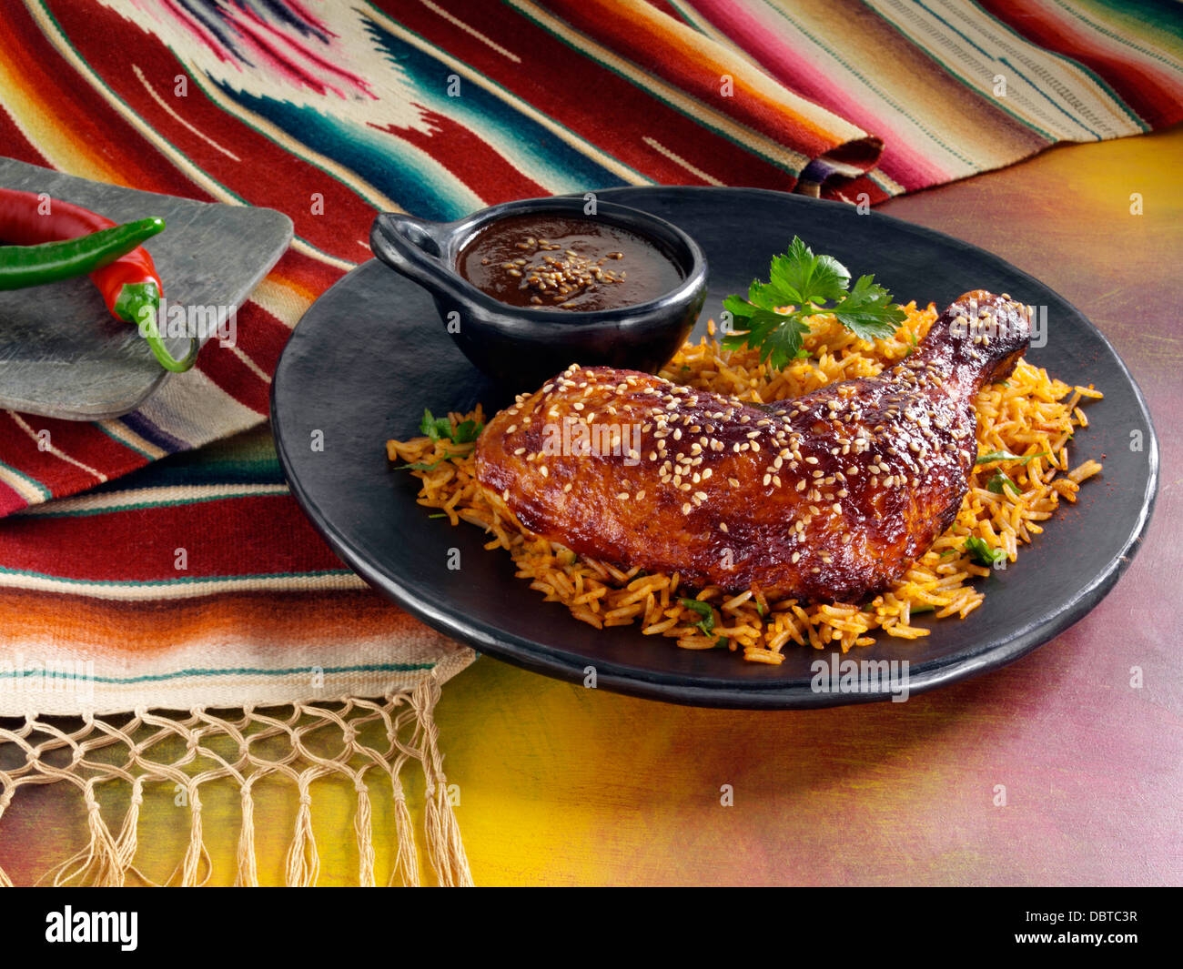 Lacquered chicken and red rice Stock Photo - Alamy