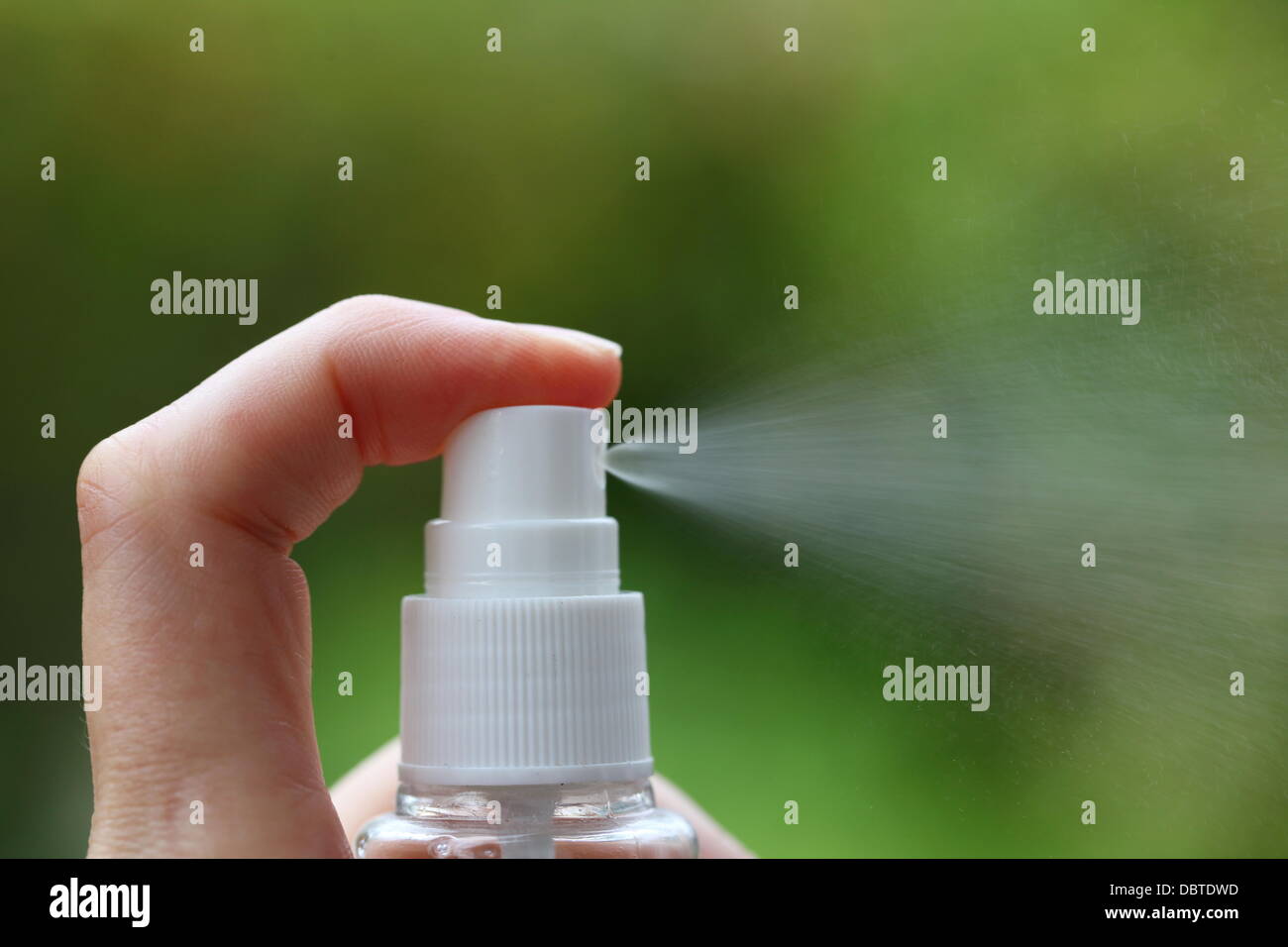A finger presses a spray head pictured in Muenster-Altheim, Germany, 26 ...