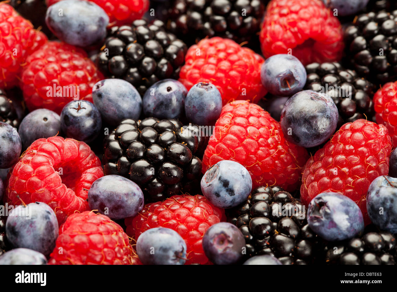 Raspberry, blackberry and blueberry background Stock Photo - Alamy