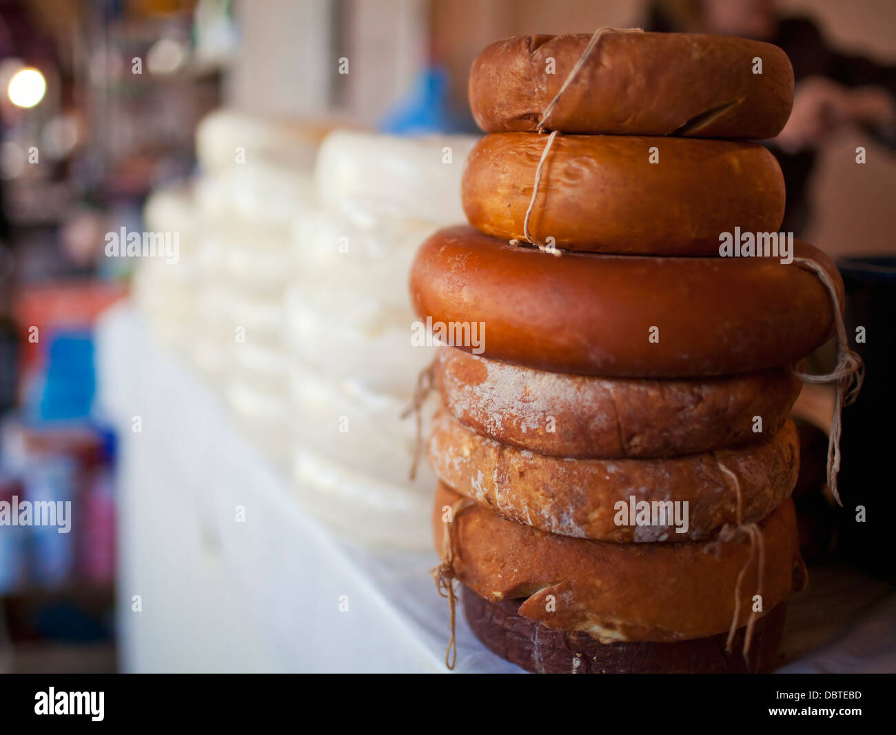 Stack of cheese at farmer market Stock Photo - Alamy