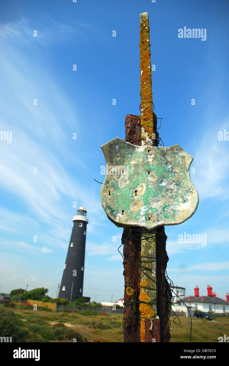 Rusty post and Old Dungeness Lighthouse Stock Photo - Alamy