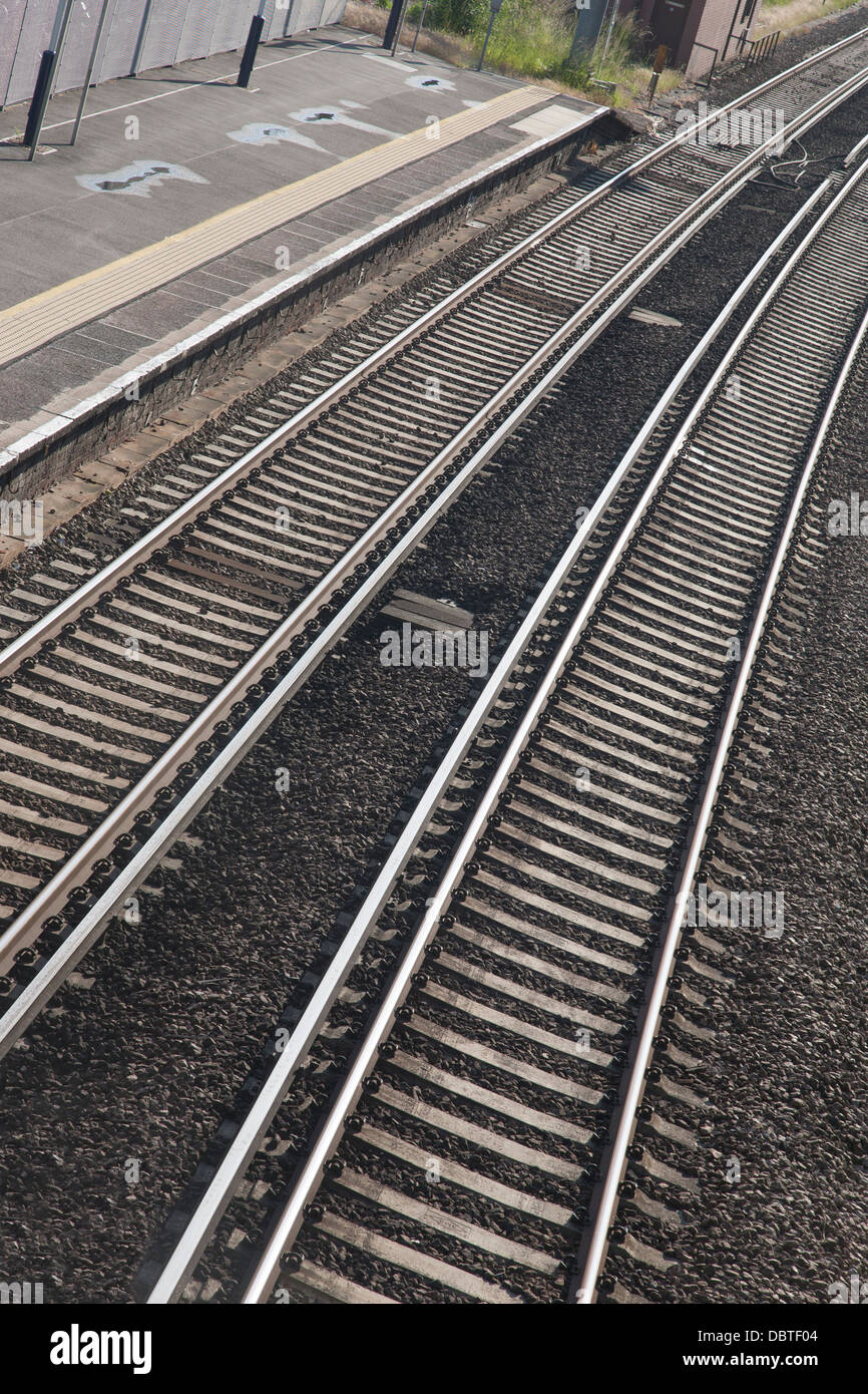 Curve of Railroad Train Track and Platform Stock Photo - Alamy