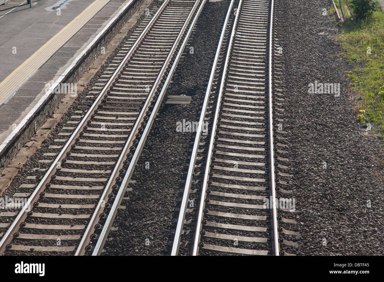 Railway Line Tracks and Station Platform Stock Photo - Alamy